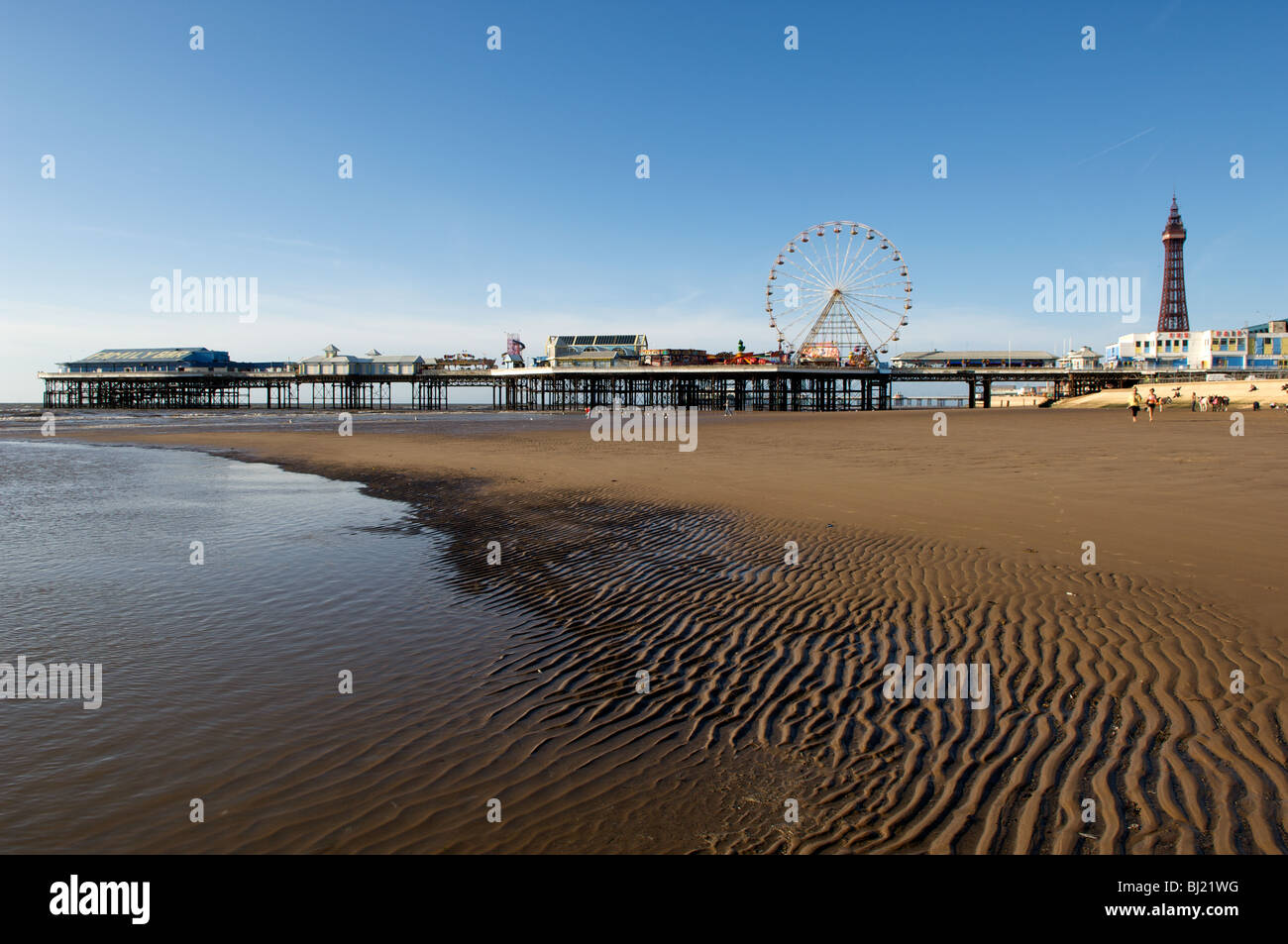 Blackpool Tower, the piers and the Pleasure Beach are the landmarks of ...