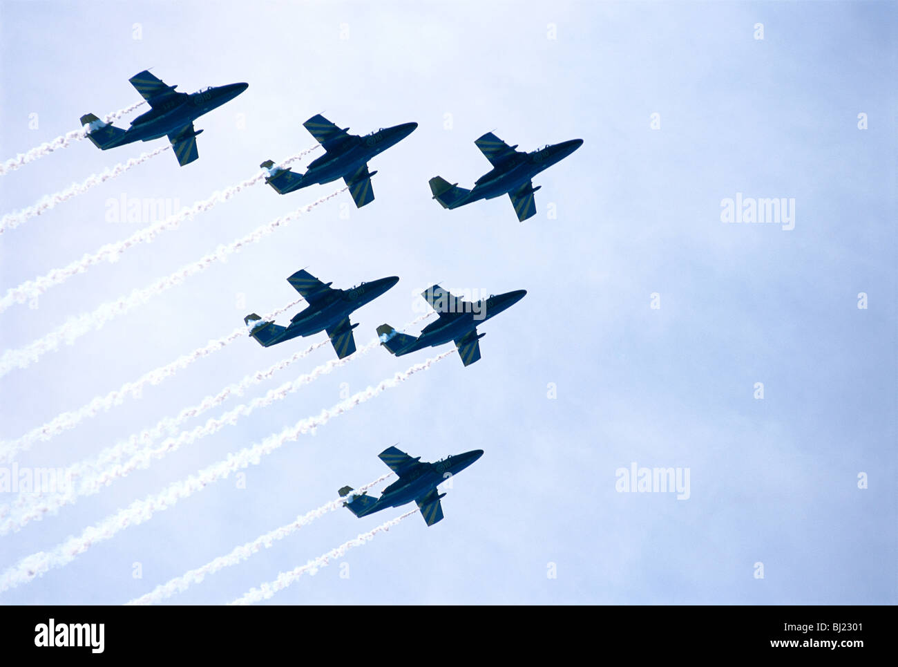 Airplanes in a formation Stock Photo - Alamy