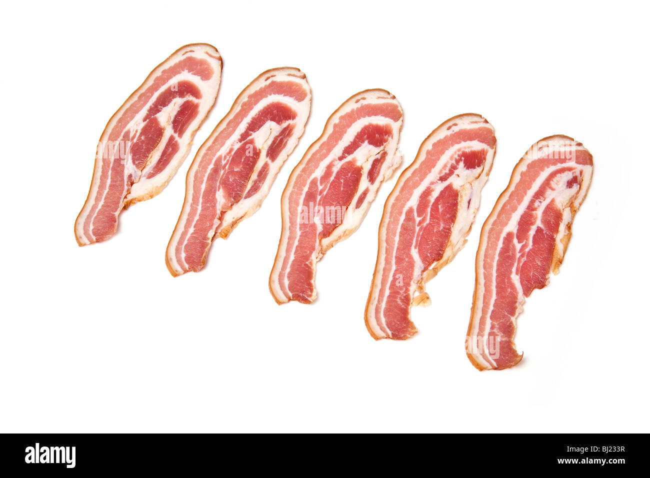 Streaky bacon rashers isolated on a white studio background Stock Photo ...
