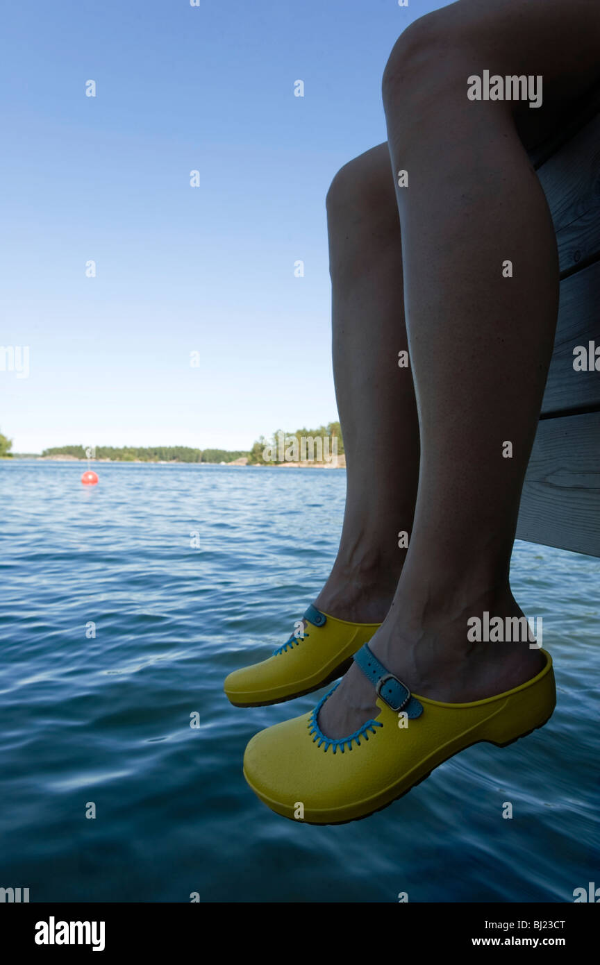 Women legs dangling hi-res stock photography and images - Alamy