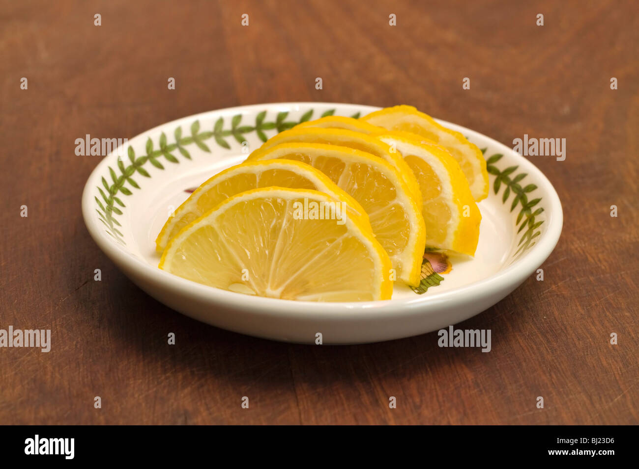 Dish of lemon slices Stock Photo - Alamy