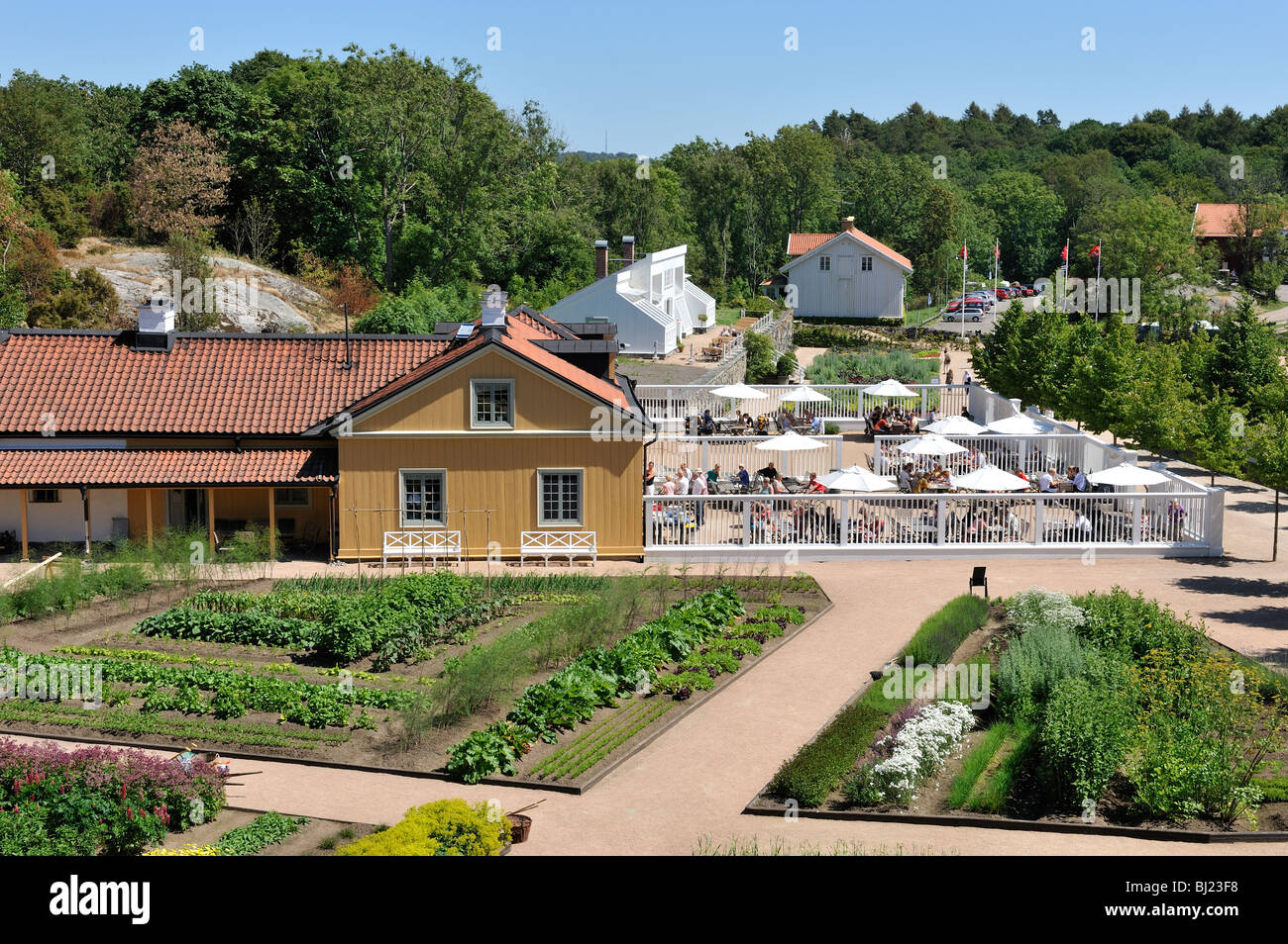 An open-air cafe by a garden, Sweden Stock Photo - Alamy