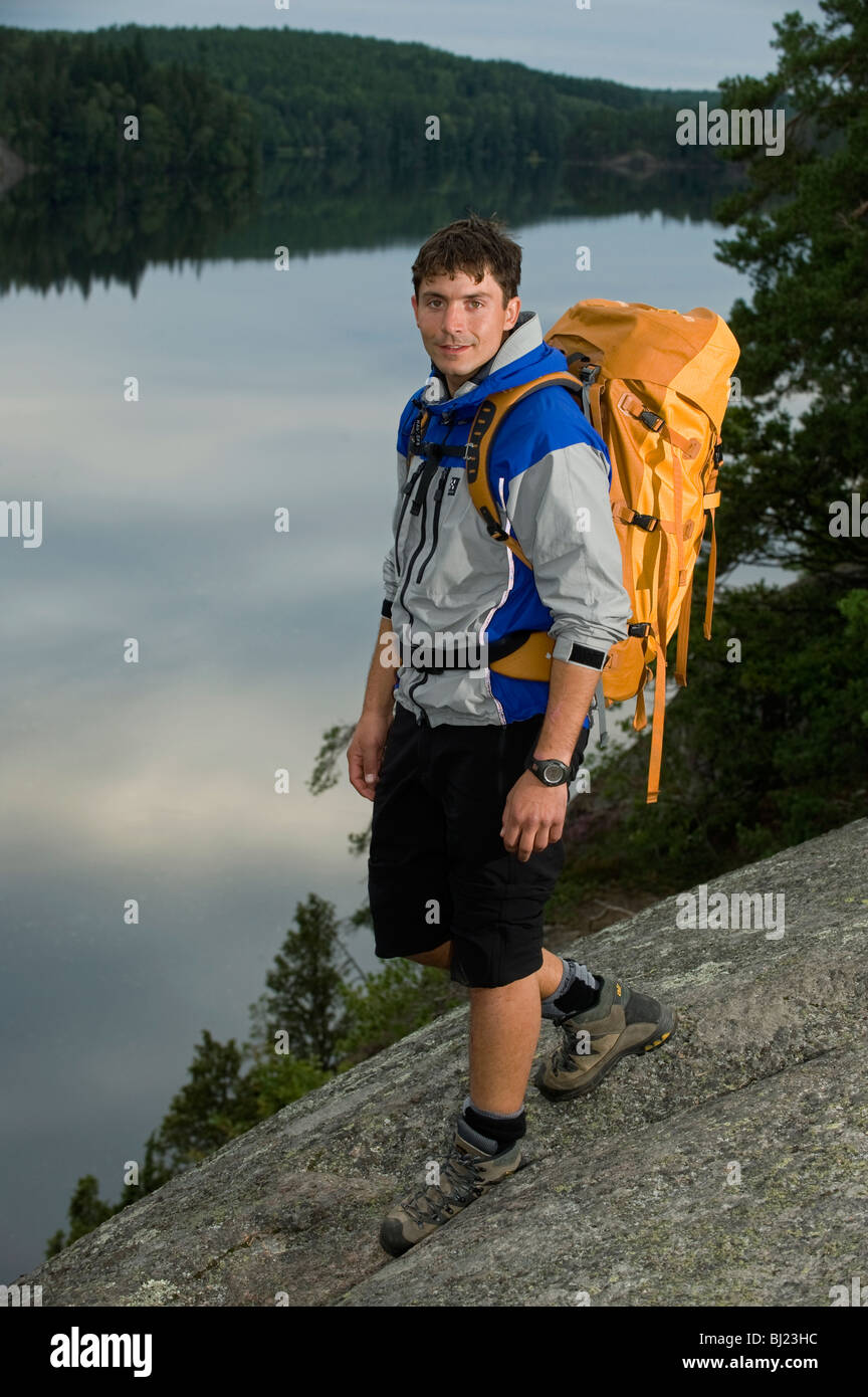 Jolly young man hiking in hi-res stock photography and images - Alamy