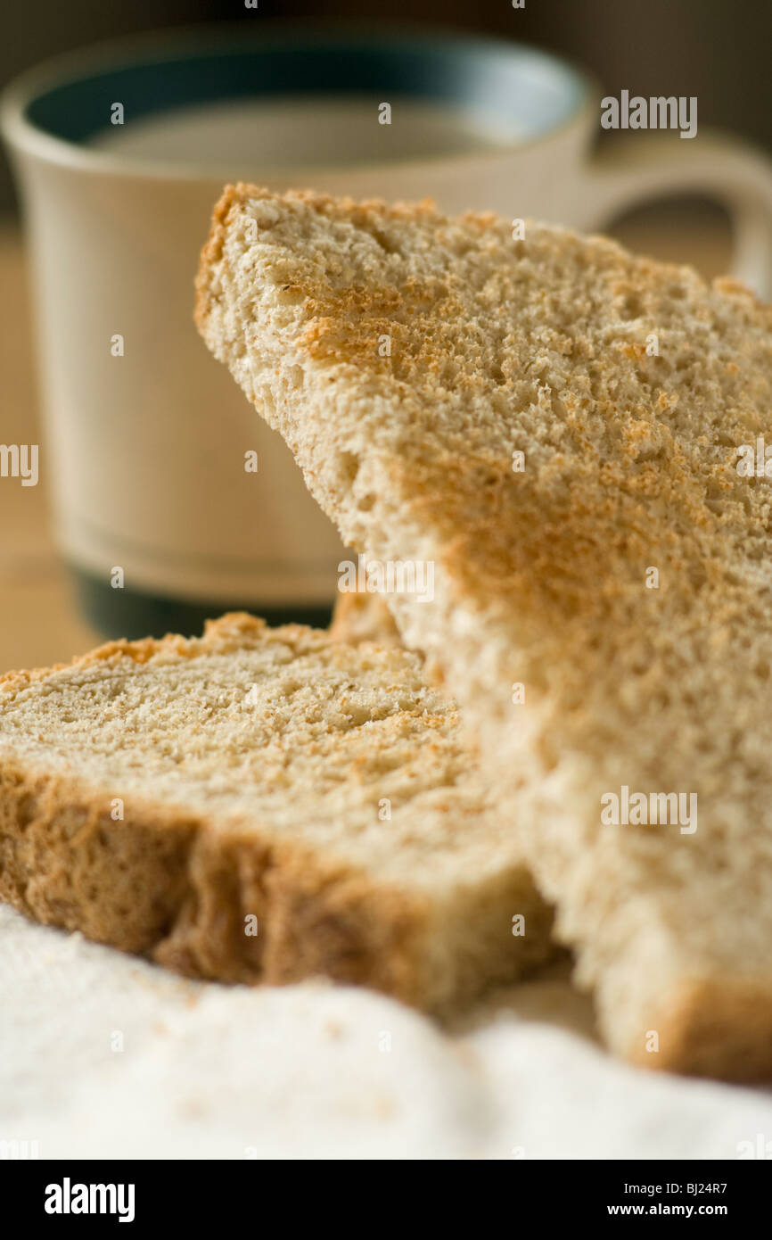 Wholemeal toast with mug Stock Photo - Alamy