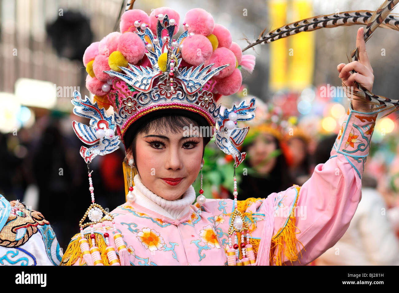 A performer at the Chinese New Year parade in the streets of Paris ...