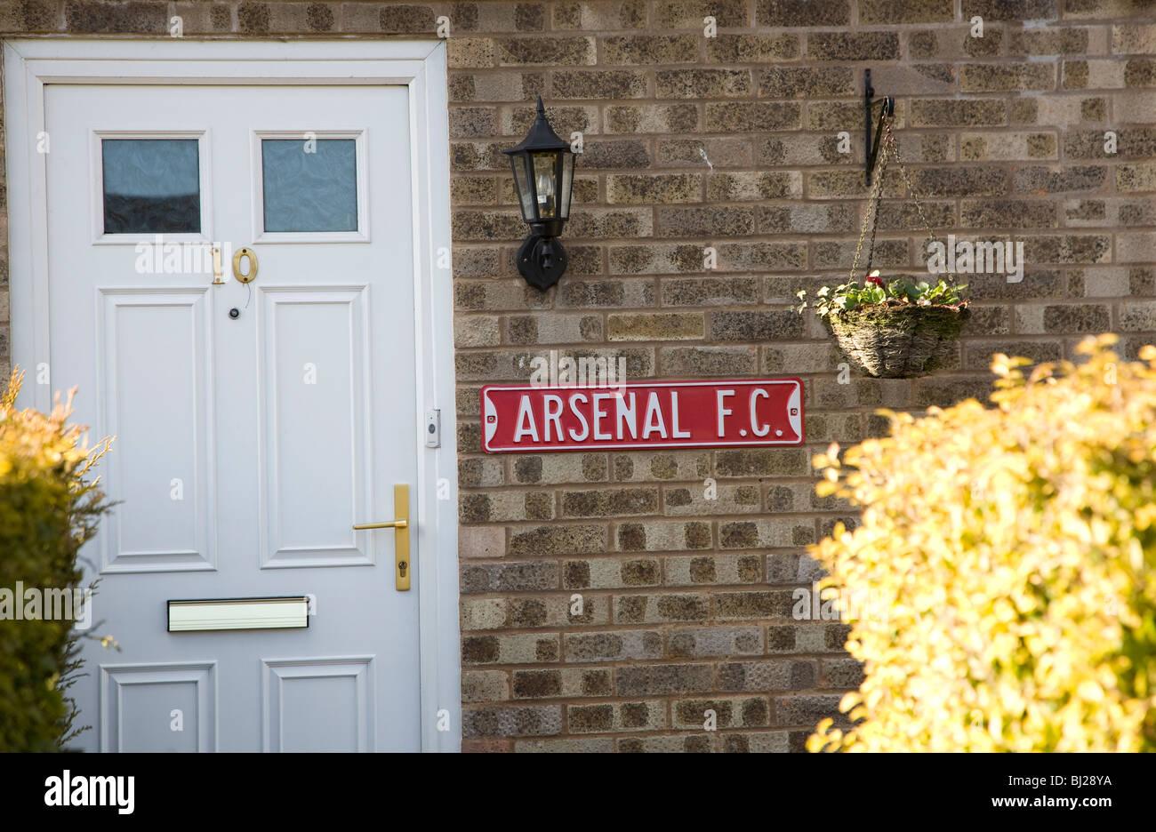 Arsenal FC sign on house in Northamptonshire village, England Stock ...