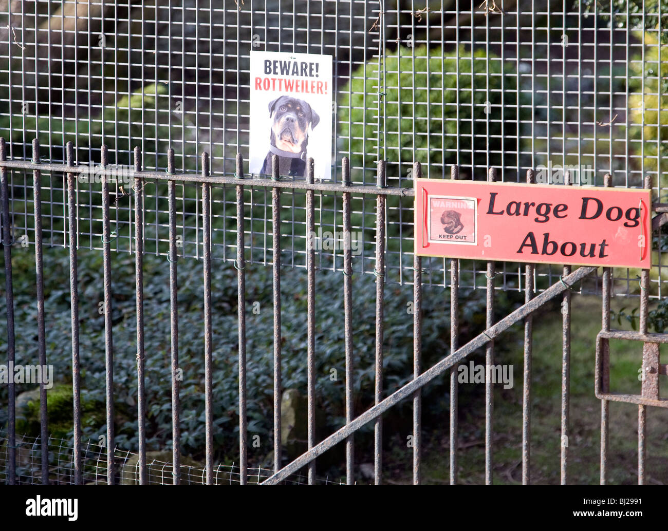 Bewareof the Dog signs on gates of house in Northamptonshire village ...