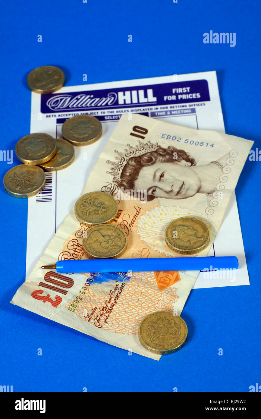William Hill Betting slip with ten pound note and pound coins Stock ...