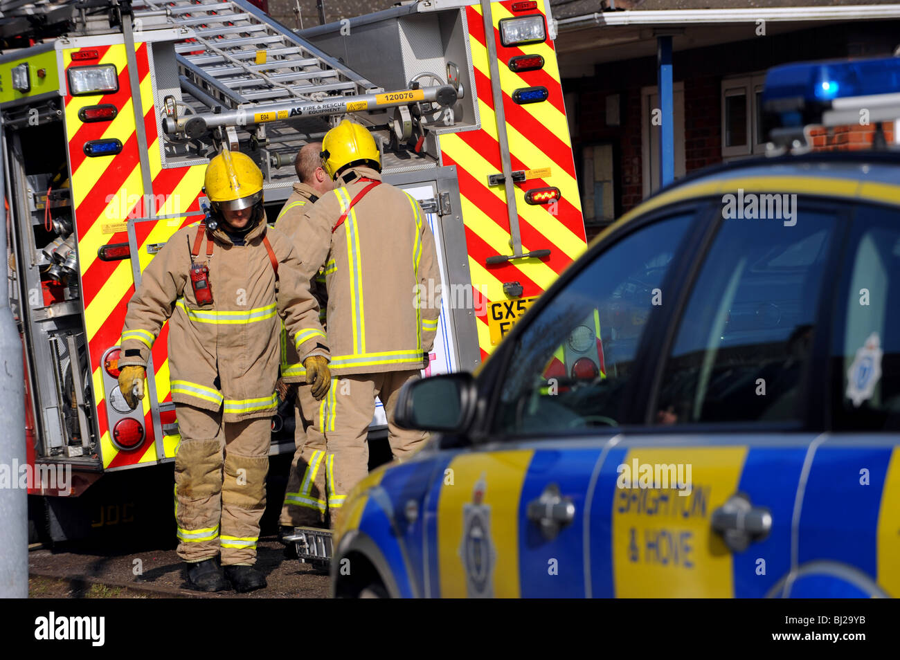 Police and firefighters working at the scene of a serious house fire in ...