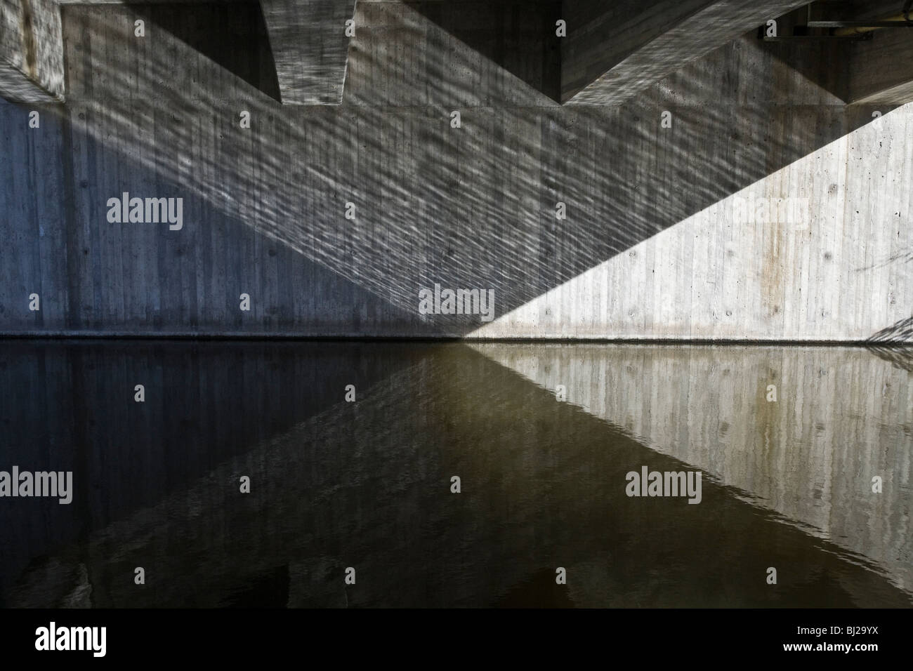 Geometric reflections under bridge Stock Photo - Alamy