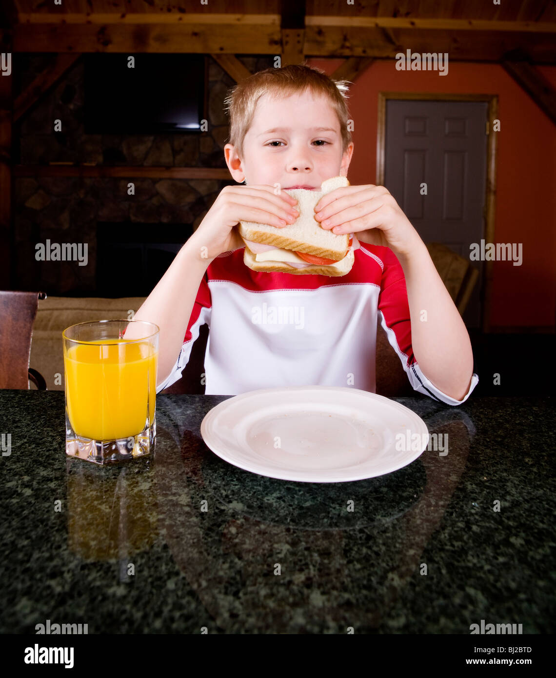Boy sandwich ham hi-res stock photography and images - Alamy