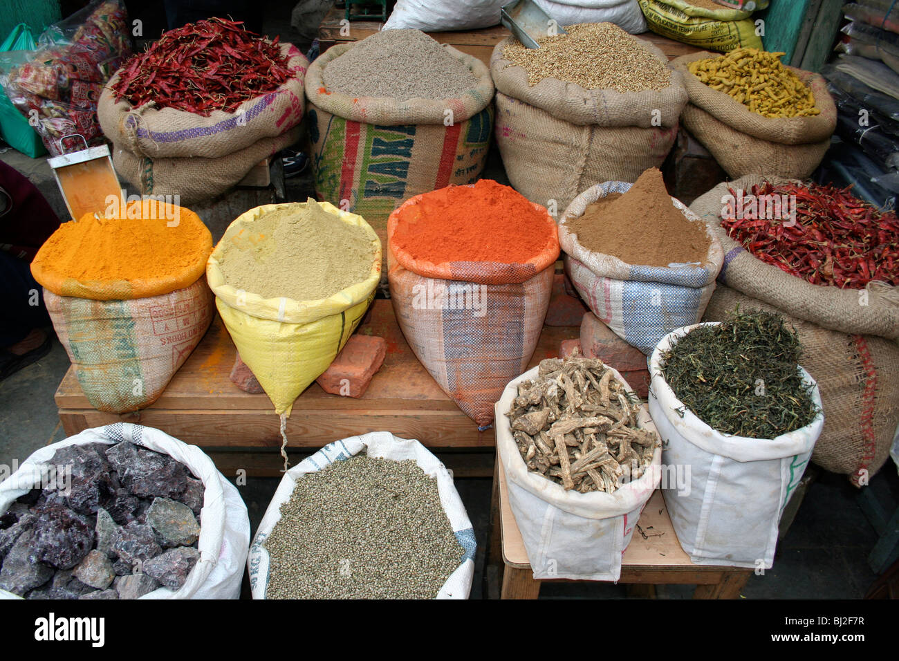 Sacks of colourful spices for sale Stock Photo - Alamy