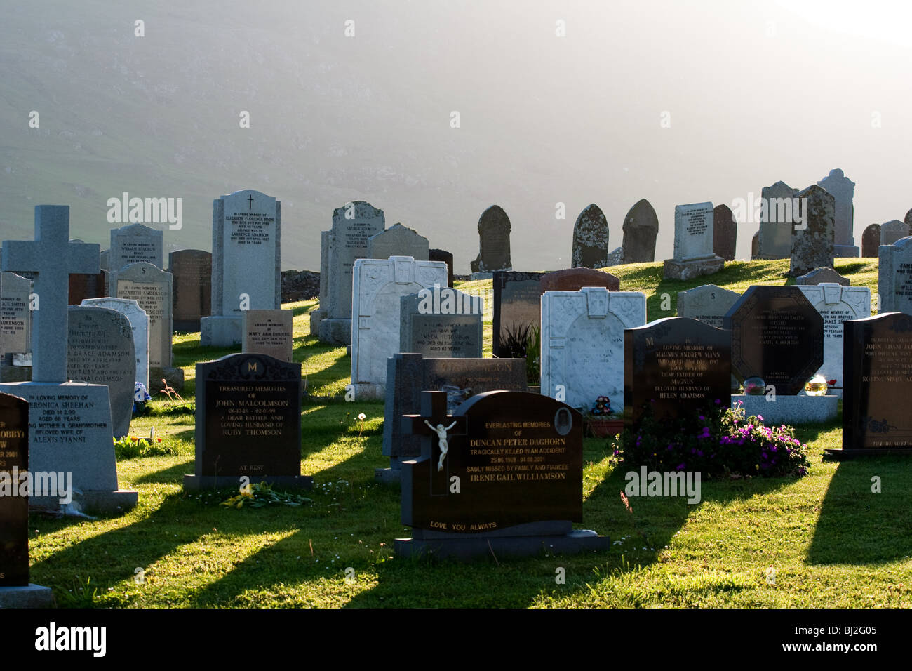 Headstone sun hi-res stock photography and images - Alamy