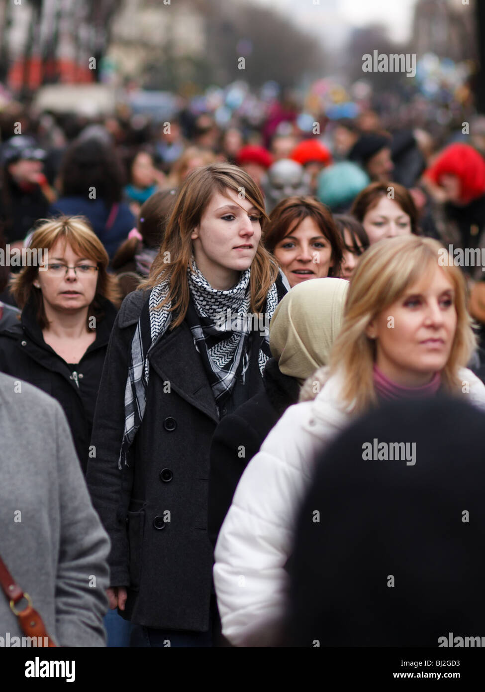 Parisian people following the carnival parade in the streets of Paris ...