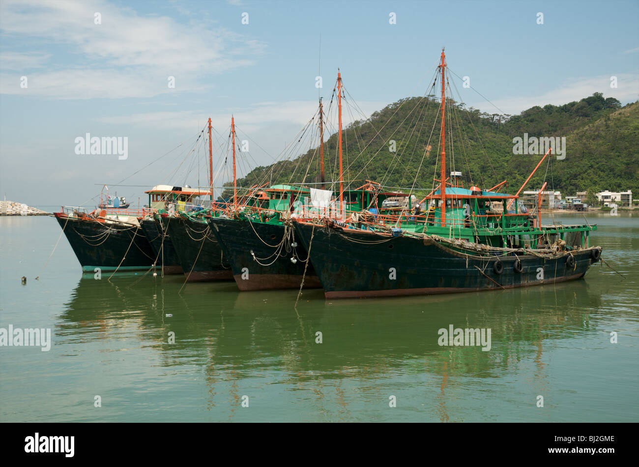 Fishing boats in Tai O harbor, Hong Kong Stock Photo - Alamy