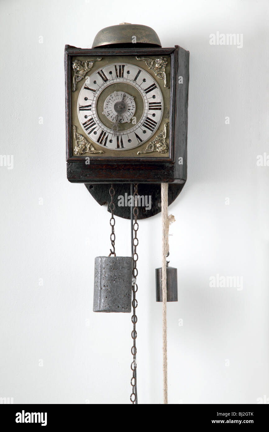 Hooded wall clock Stock Photo - Alamy