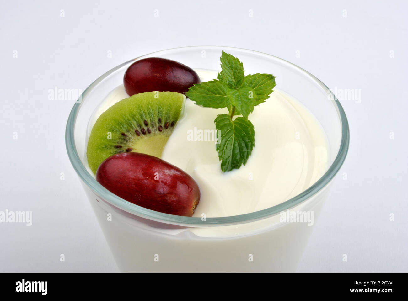 some organic fruit in natural yoghurt and mint Stock Photo - Alamy