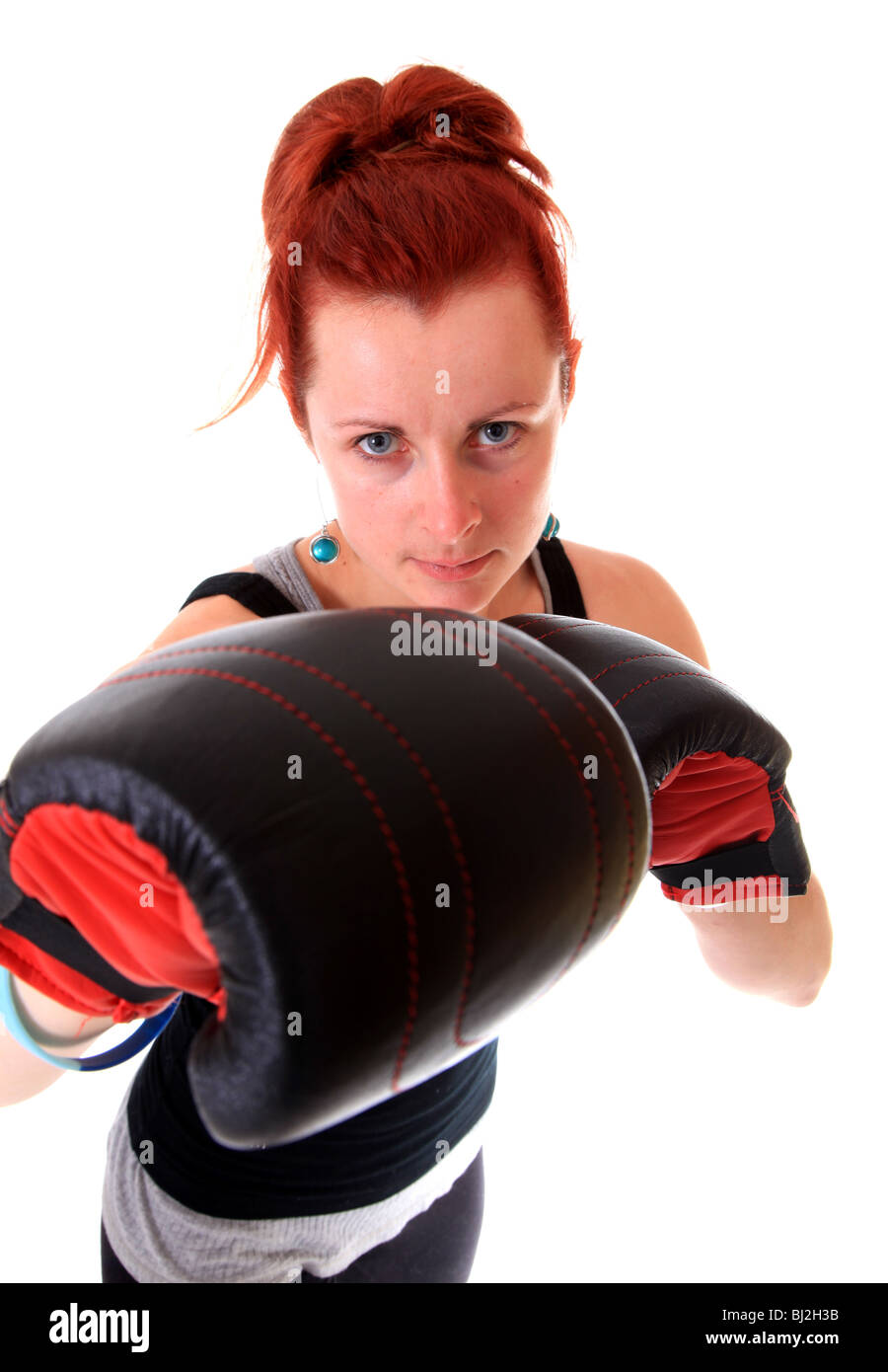 Woman keeping fit by boxing Stock Photo - Alamy