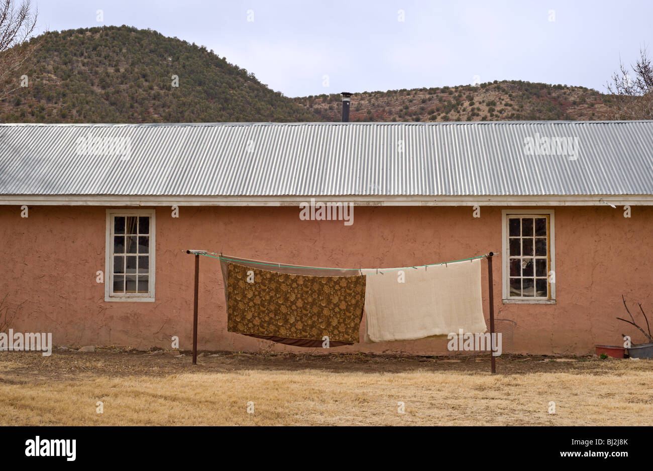 An old adobe house still overlooks main street in Billy the Kid's wild ...