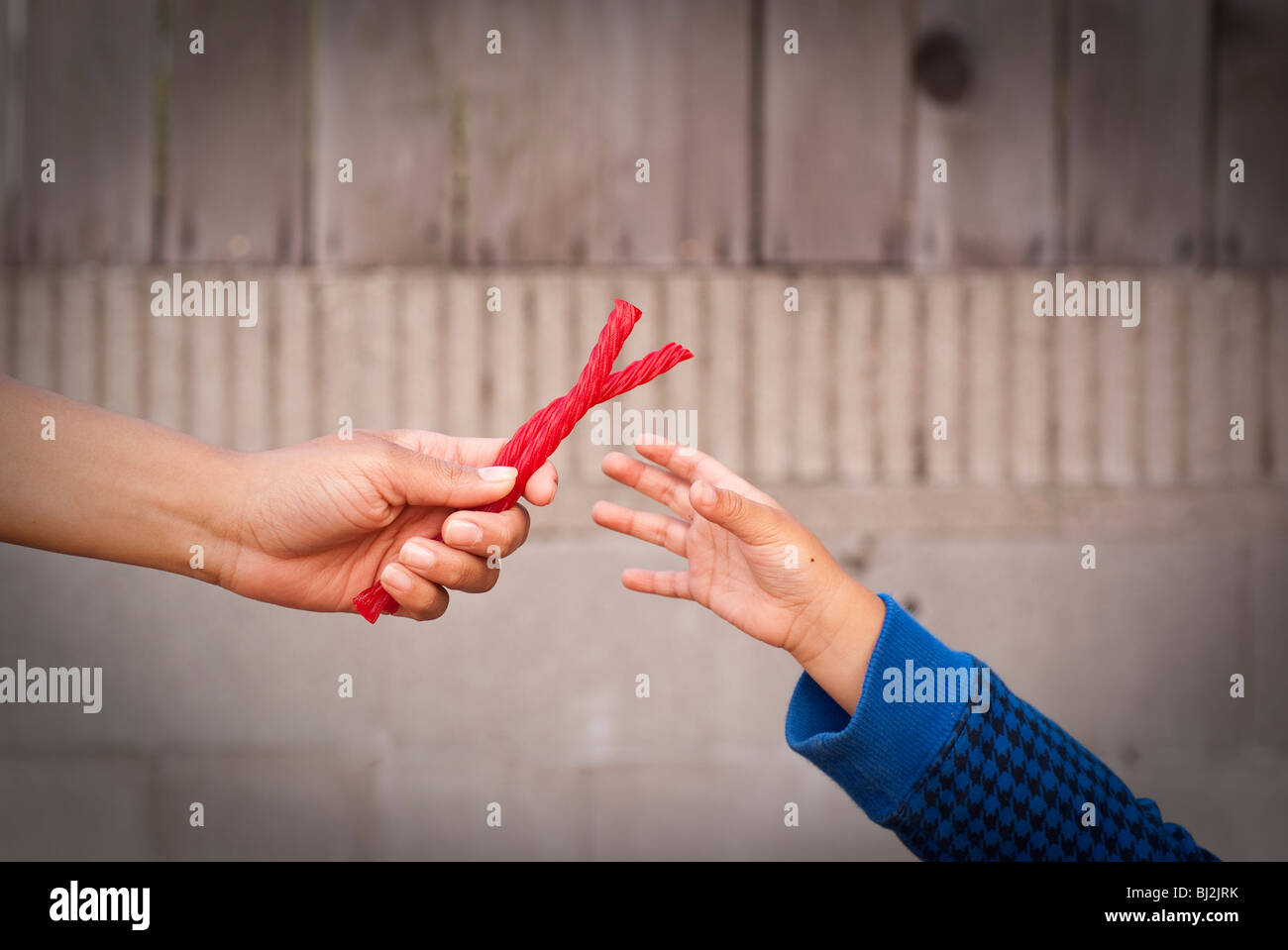 Children sharing sweets hi-res stock photography and images - Alamy