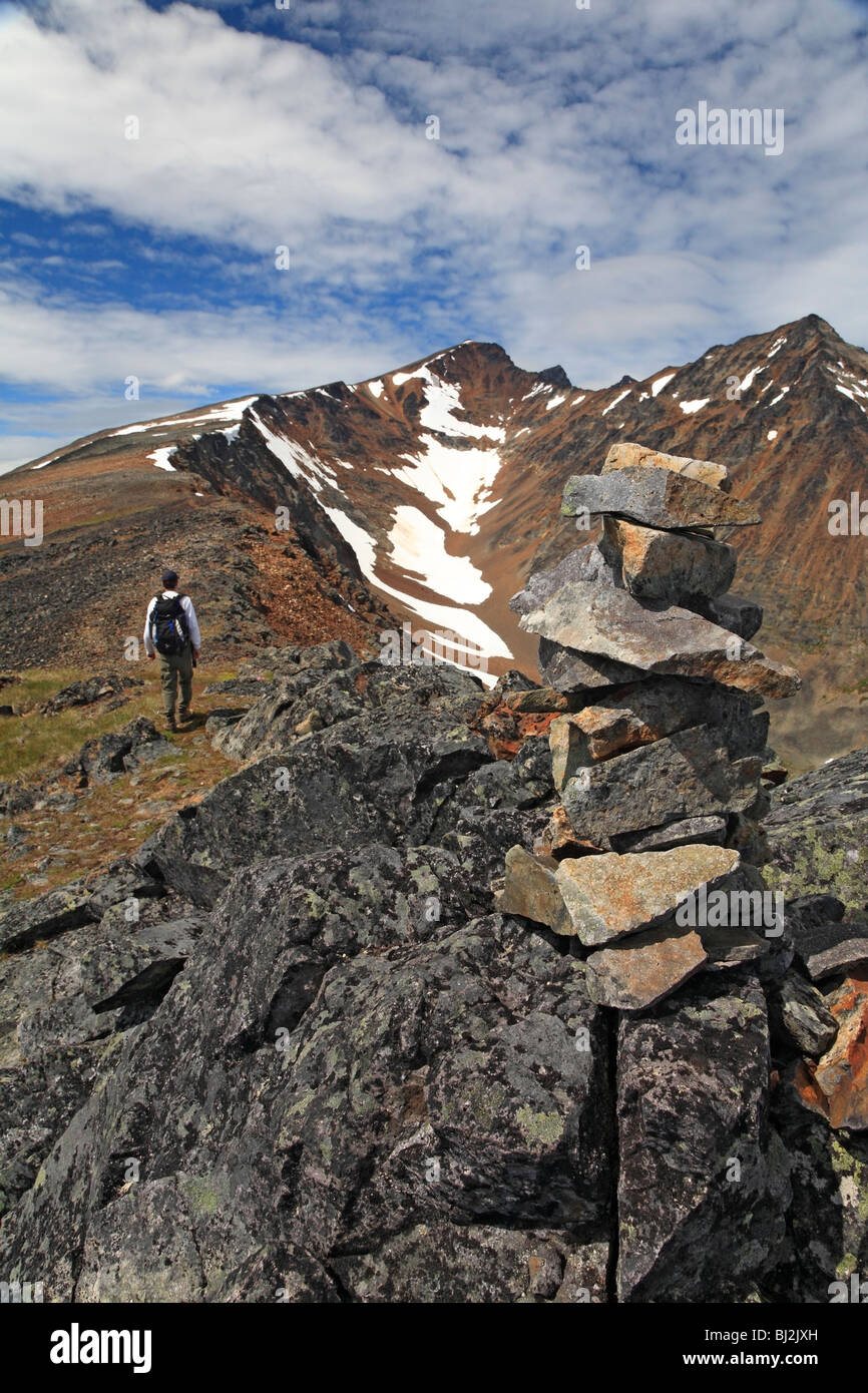 Hiker on trail up to peak of Hudson Bay Mountain, Smithers, British ...