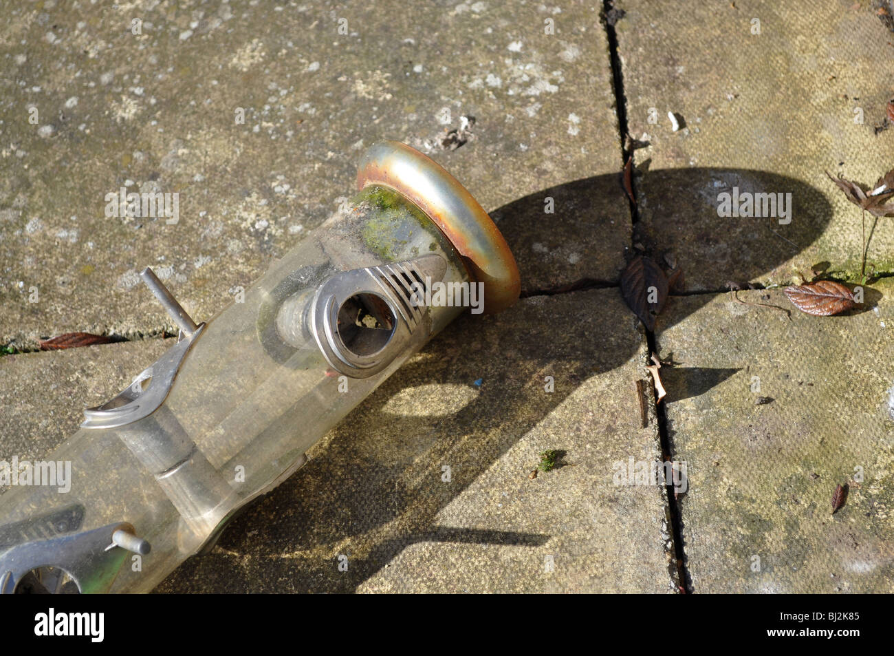 broken empty bird feeder Stock Photo - Alamy