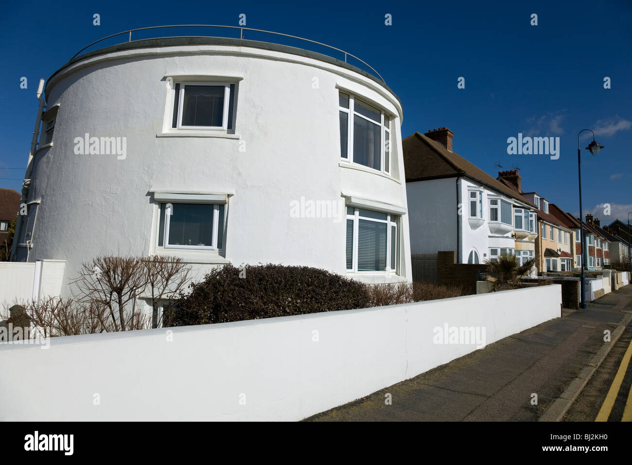 Houses in Hythe,Kent with Martello Tower house conversion in foreground ...