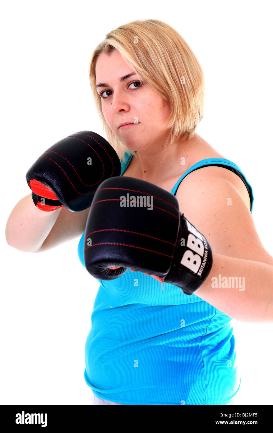 Woman keeping fit by boxing Stock Photo - Alamy