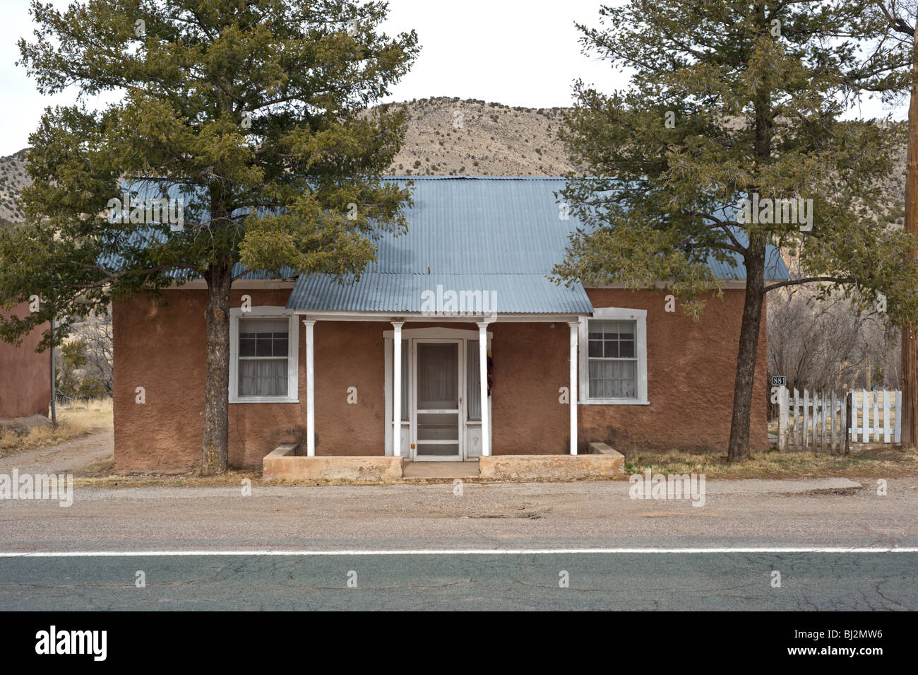 An old adobe house still overlooks main street in Billy the Kid's wild ...