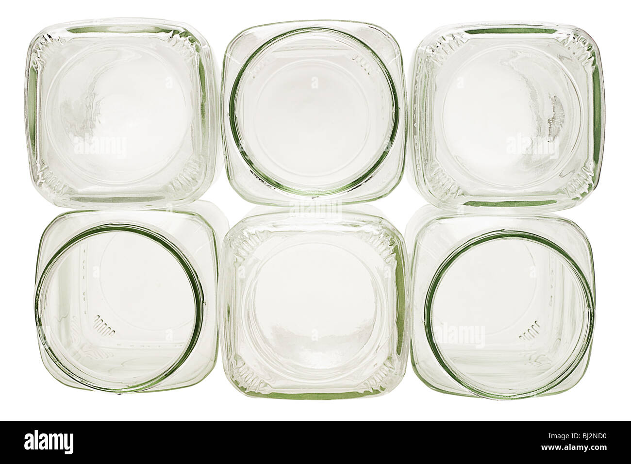 Stack of empty glass containers on white background Stock Photo - Alamy