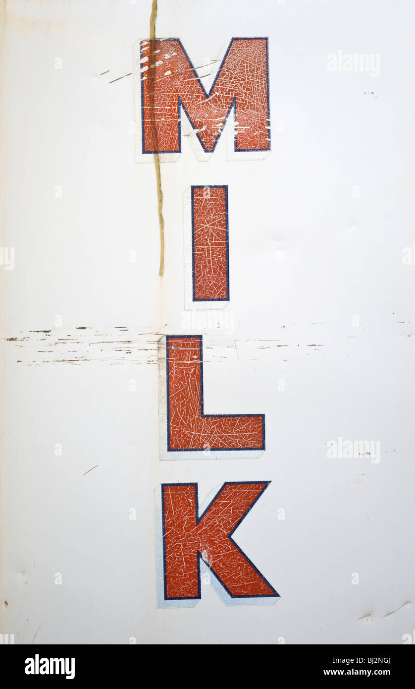 An old dented and scratched milk sign in Billy the Kid's wild west town ...