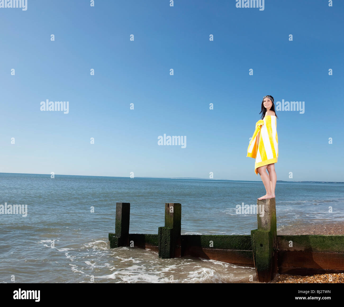 Smiling young woman exiting hi-res stock photography and images - Alamy