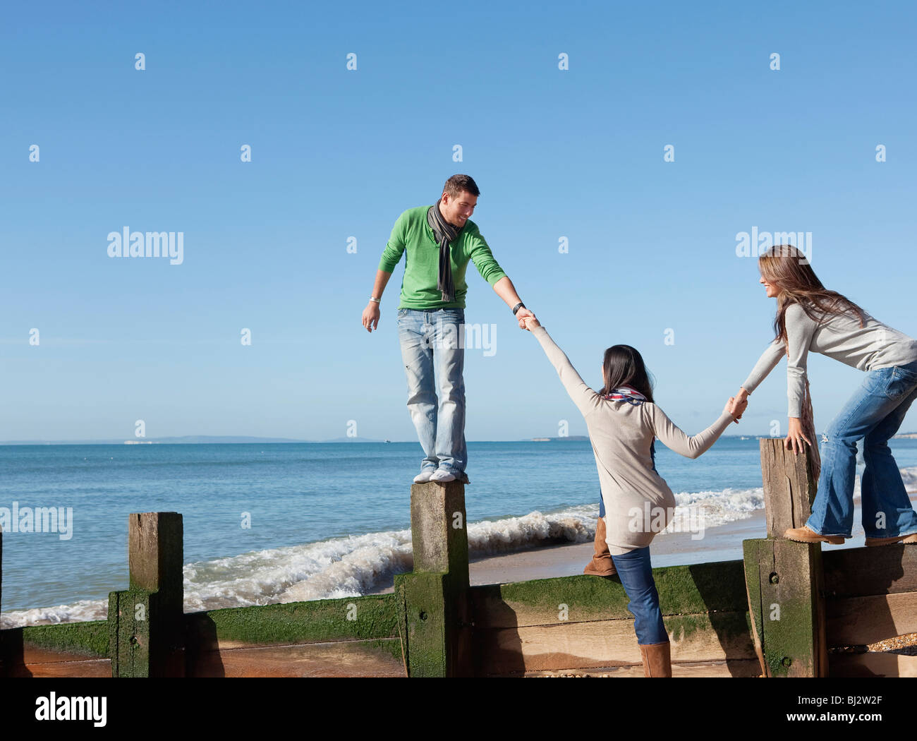 Helping hands, people, lifting hi-res stock photography and images - Alamy