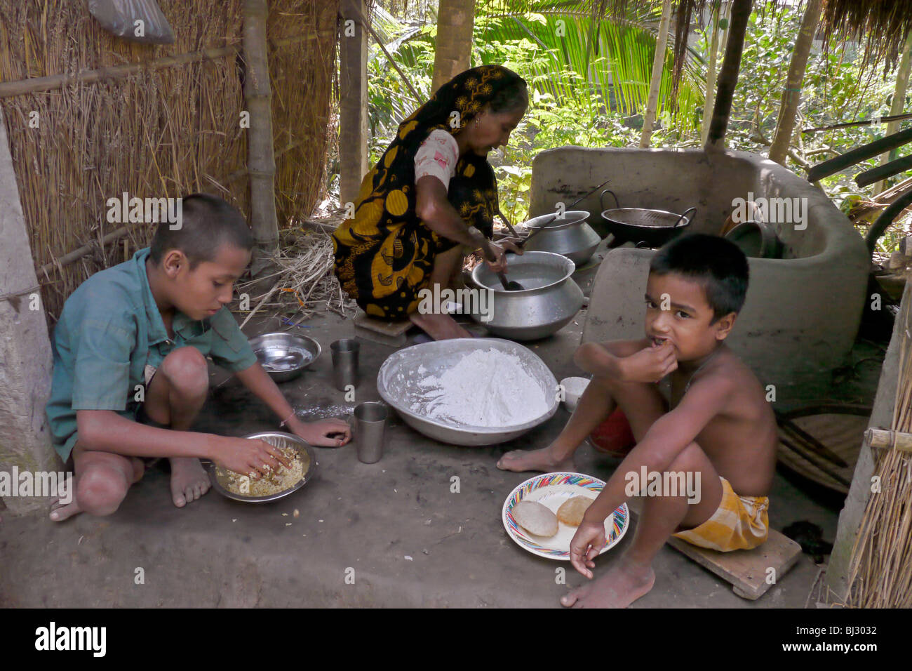 Bangladesh cooking eating food village hi-res stock photography and ...