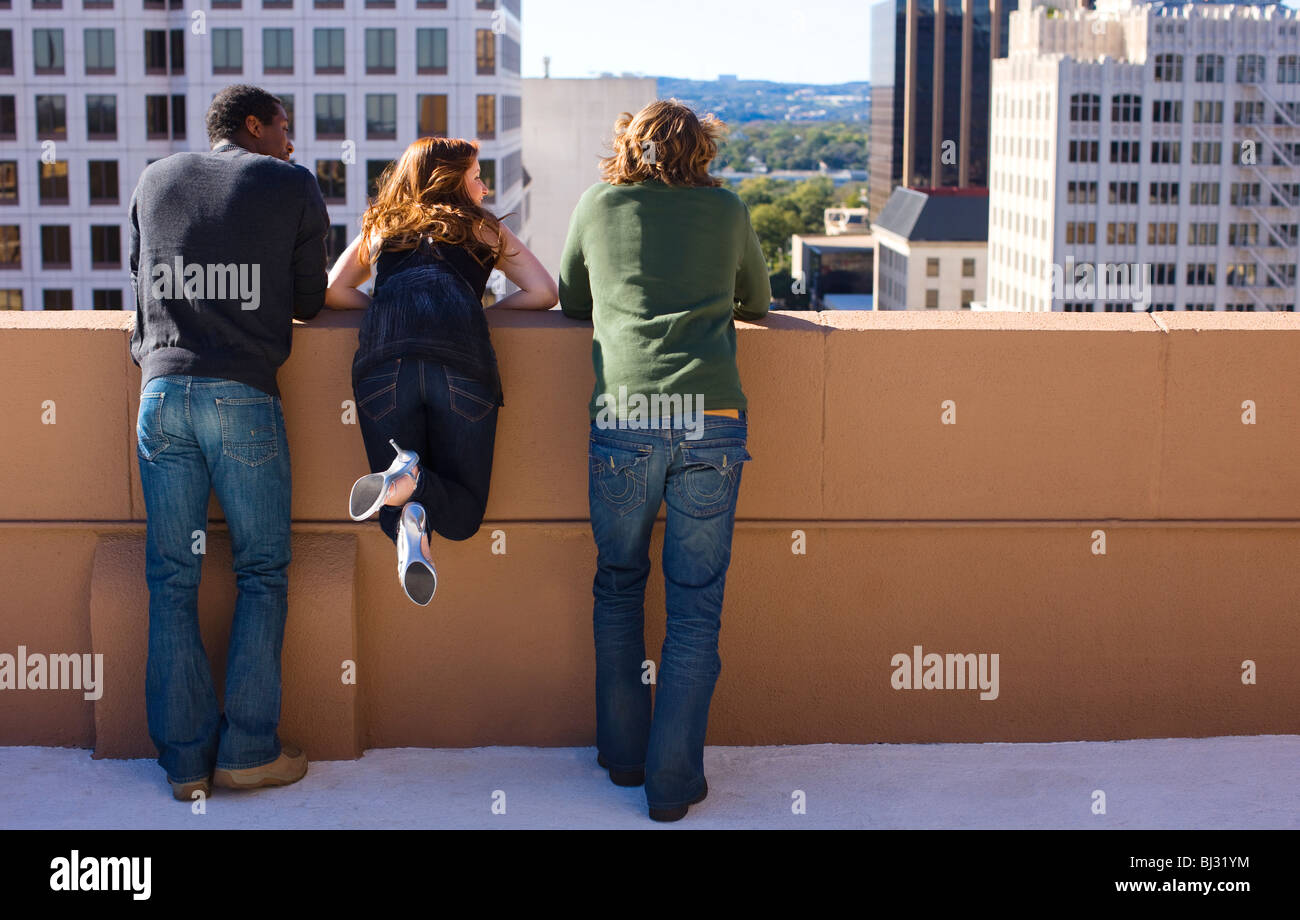 Friends on roof top in hi-res stock photography and images - Alamy
