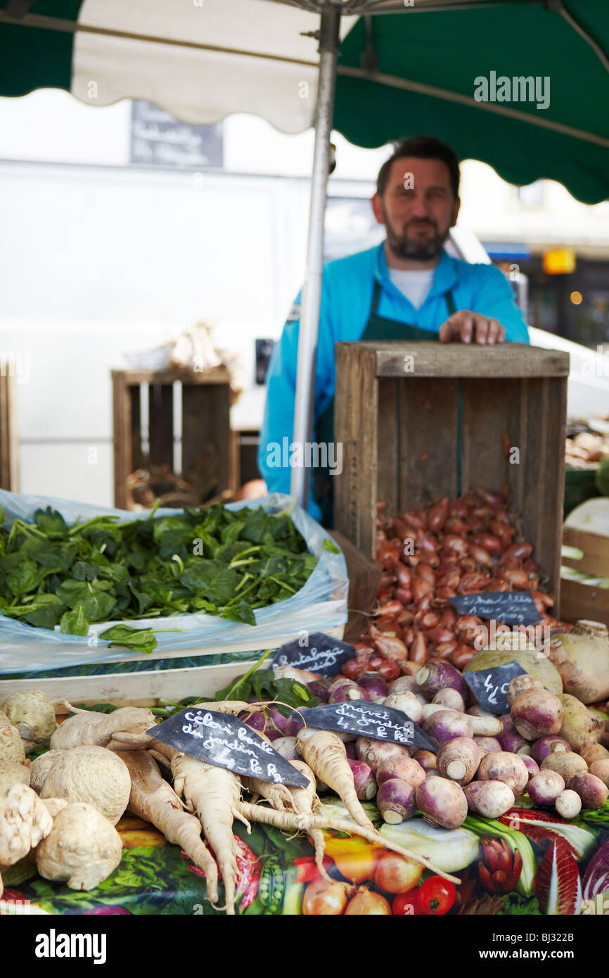 Market trader and his produce in a market in Geneva, Switzerland Stock ...