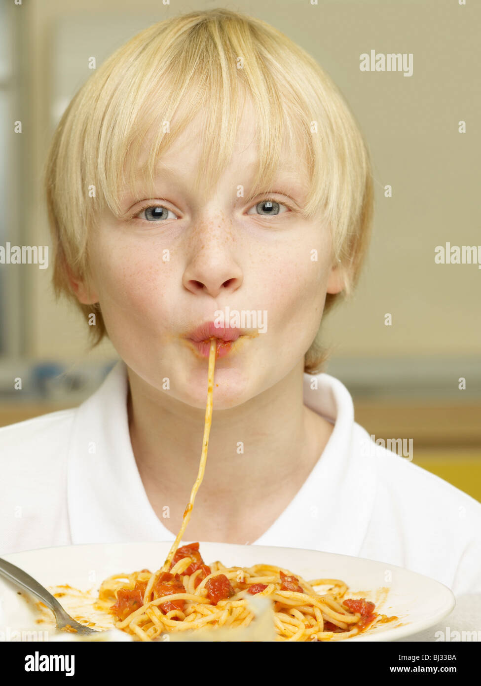 Boy eating spaghetti fun hi-res stock photography and images - Alamy