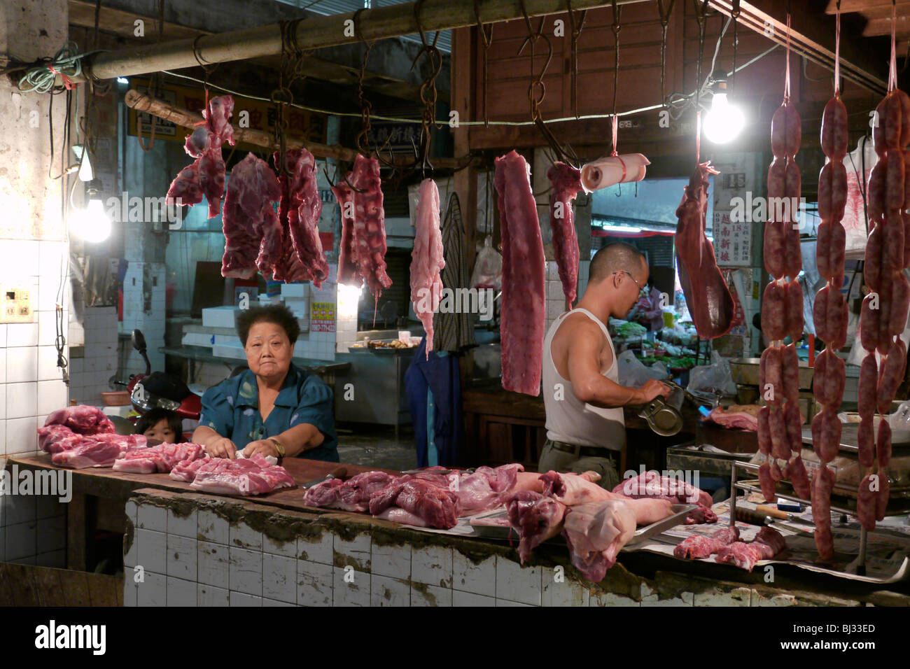 TAIWAN Produce market, Chayi, Tainan County. Meat seller. photo by Sean ...