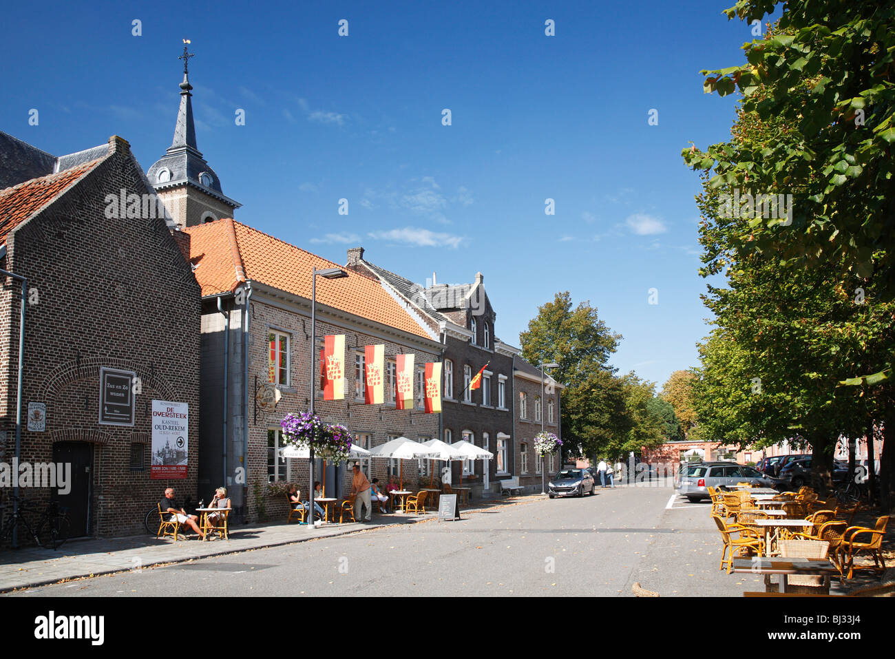 Tourists on pavement café at Oud-Rekem, Maasland, Belgium Stock Photo ...