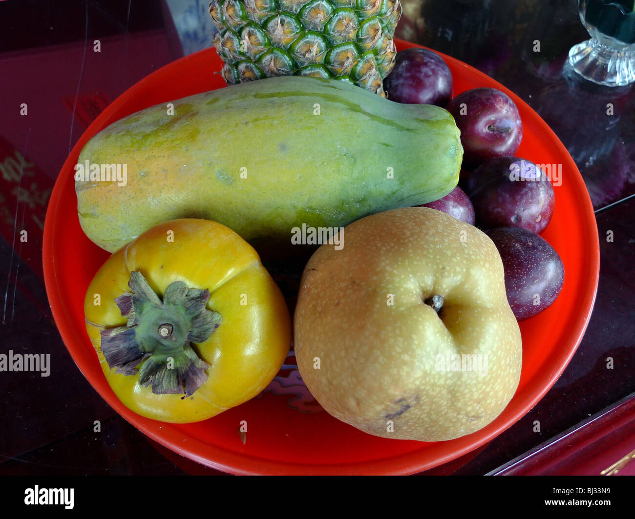 TAIWAN Chihnan Temple, Wenshan district near Taipei. Fruit on altar ...