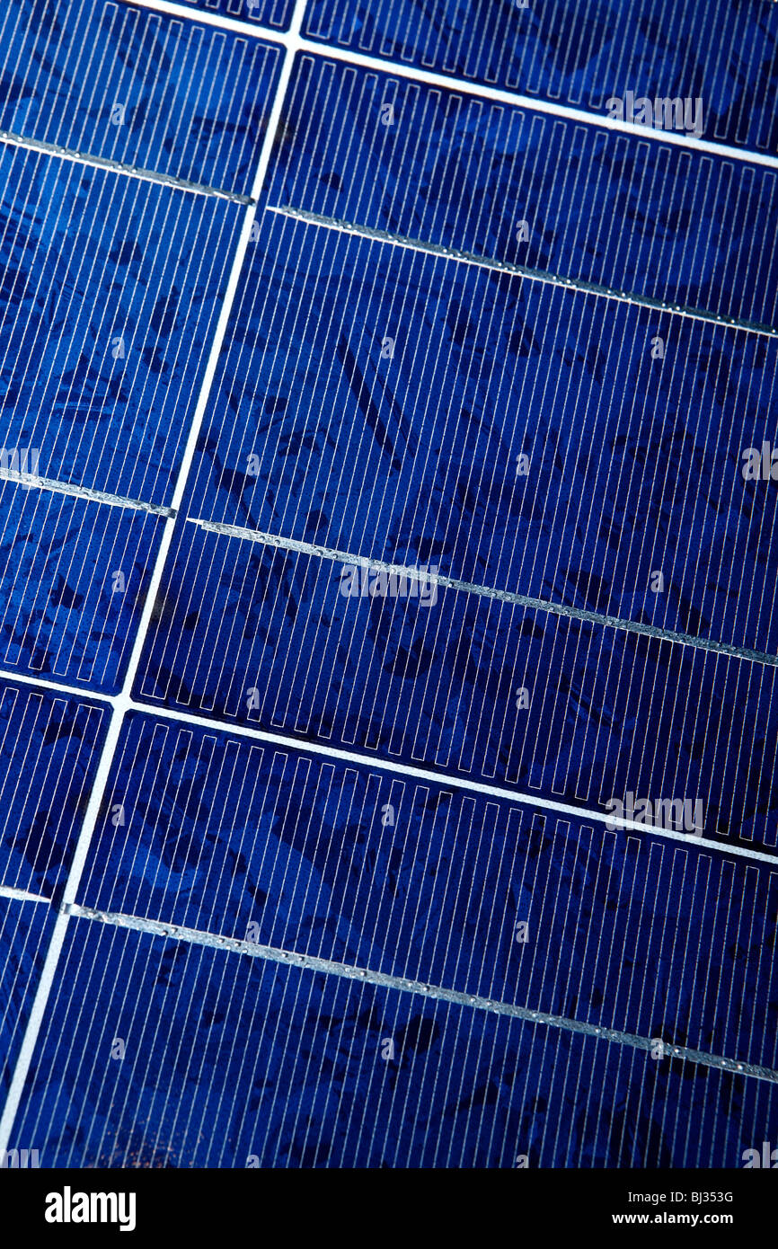 Modern solar photo voltaic panel close up with great blue cells details ...