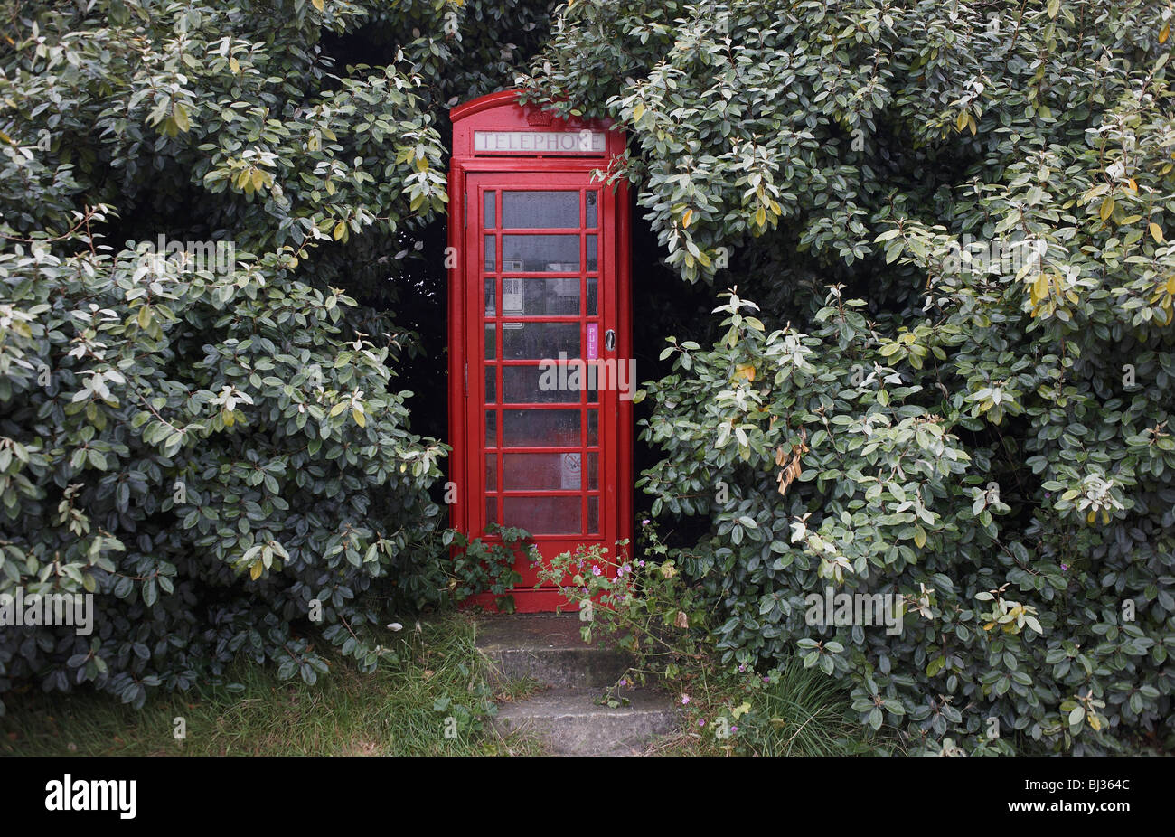 A classic, K-series red British Telecom (BT) pay phone box that is ...