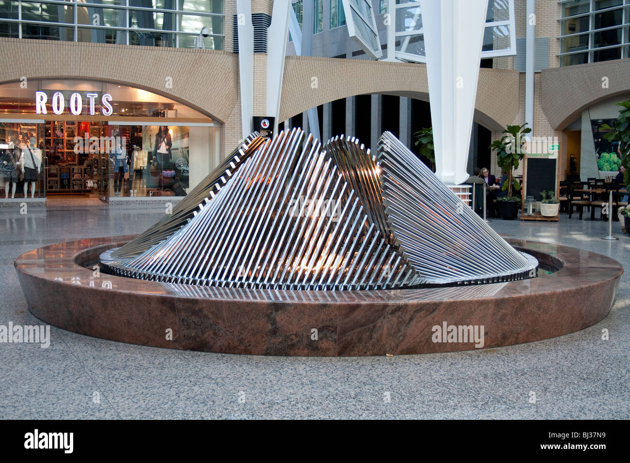 A fountain with metal decoration inside brookfield place (bce place ...