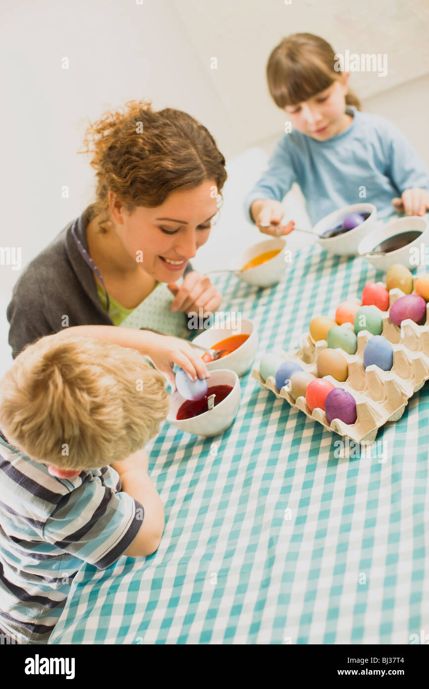 family doing Easter arrangements Stock Photo - Alamy