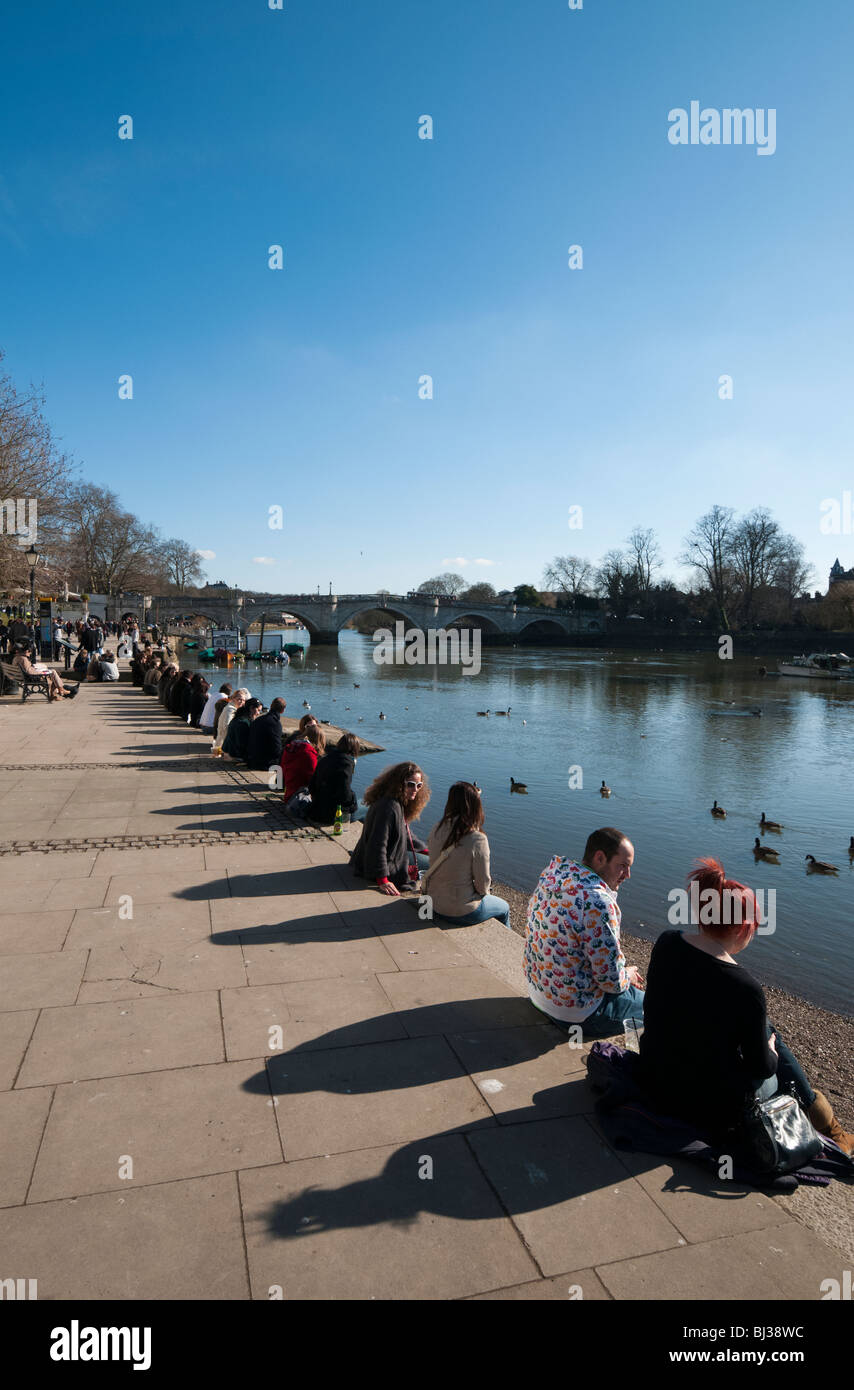 People and their Shadows by the River Stock Photo - Alamy