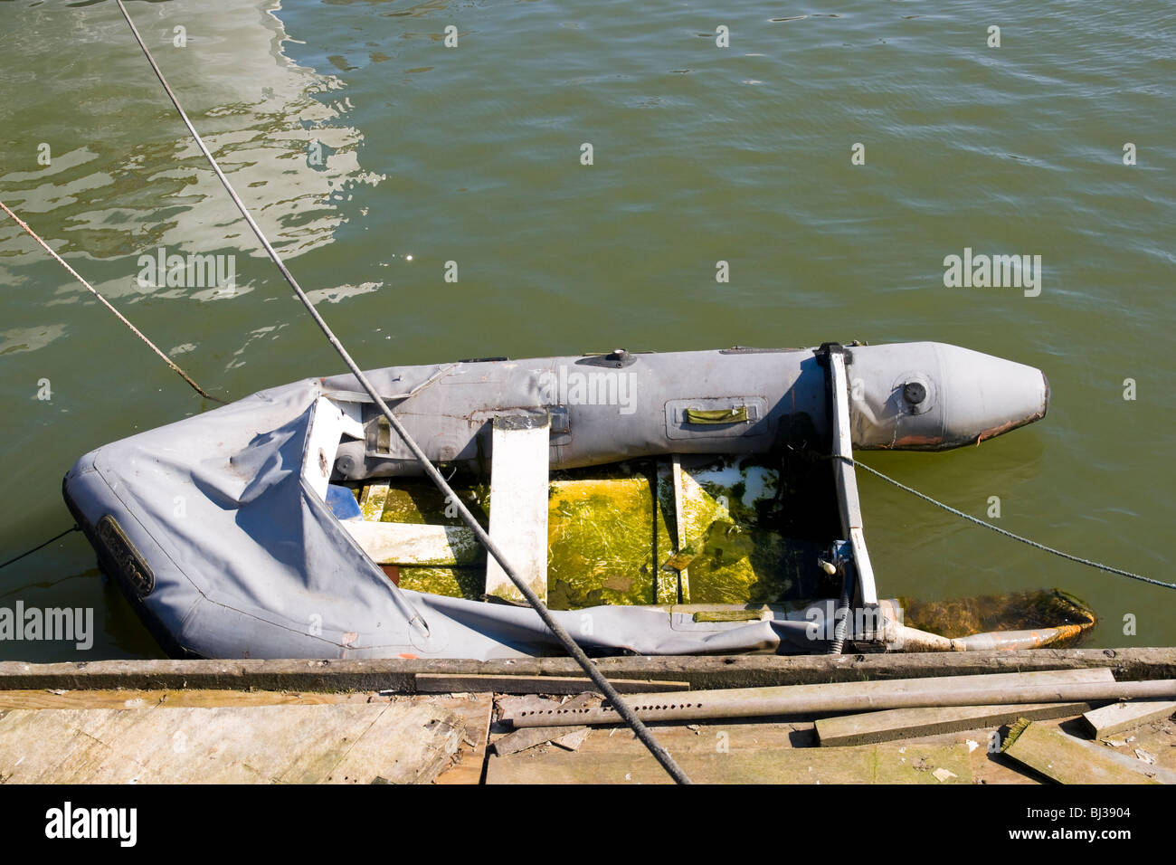 Deflated boat hi-res stock photography and images - Alamy