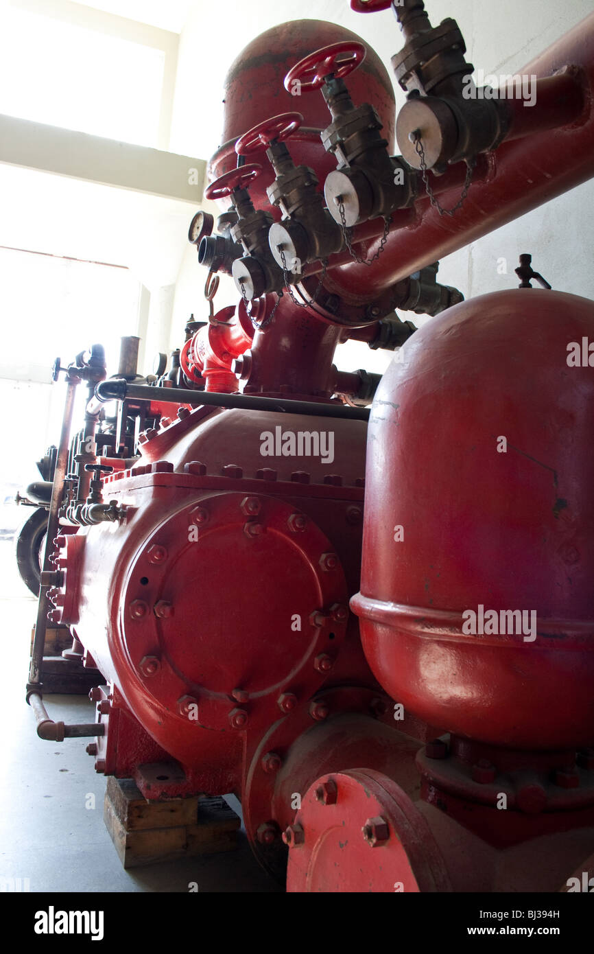 A red heavy industrial machine on display Stock Photo - Alamy