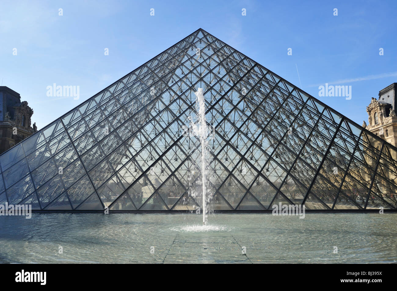 Louvre daytime pyramid hi-res stock photography and images - Alamy
