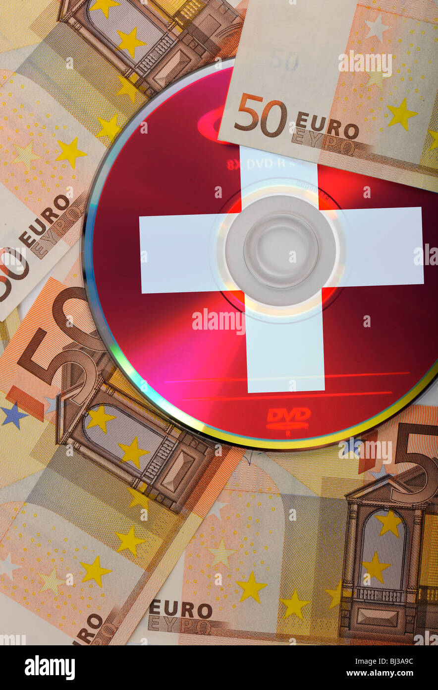 DVD, CD, euro bills, national flag of Switzerland, symbolic image for ...