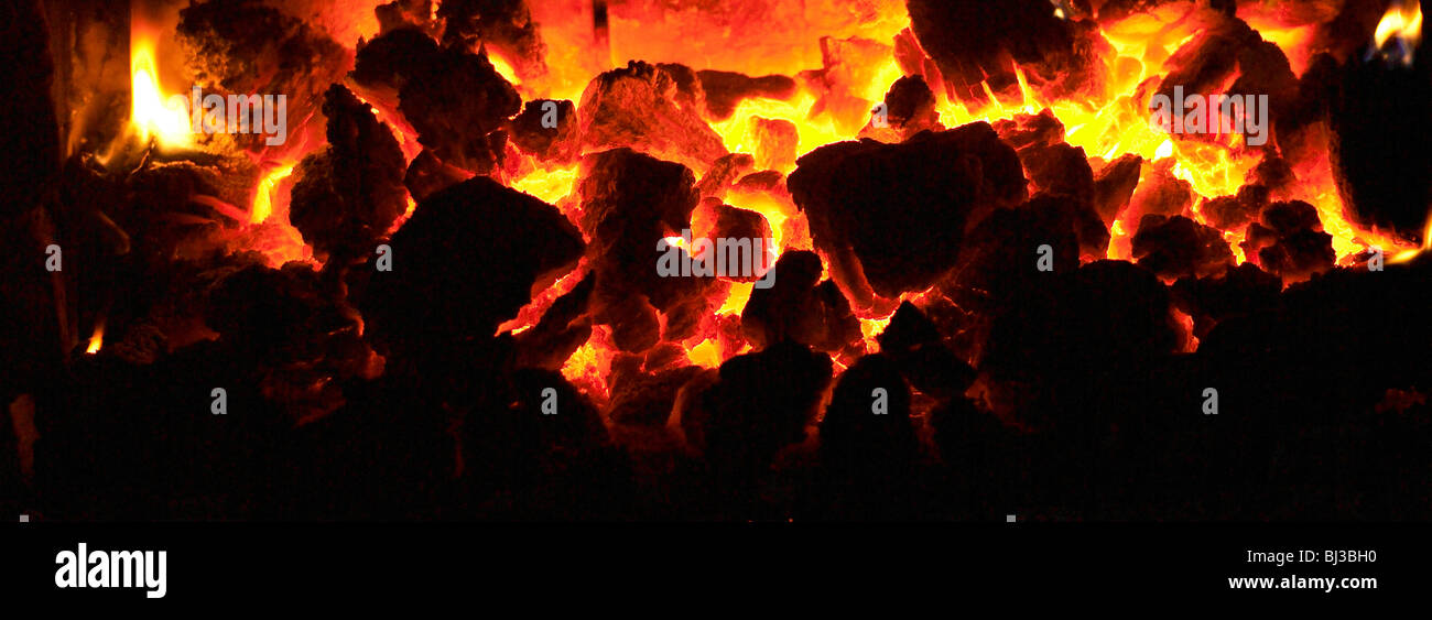 Flames of coal fire or barbeque barbecue Stock Photo - Alamy
